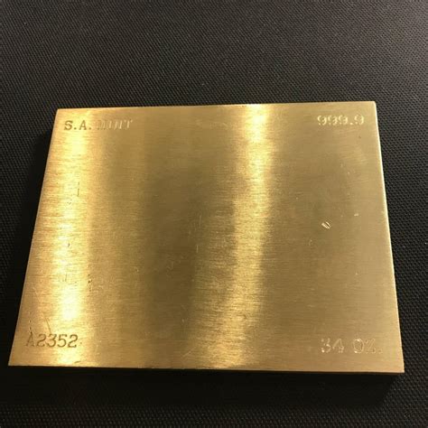 Set Of Two Gold Bar Style Brass Paperweights At 1stdibs