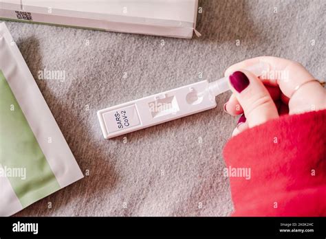 From Above Of Crop Anonymous Sick Female Dabbing Buffer With With Swab