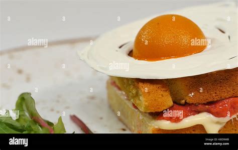 Victoria Sponge Cake With Straberries Jam And Whipped Cream With A Cut