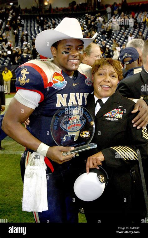 Navy Midshipmen Quarterback Ricky Dobbs 4 Shows His Mvp Trophy Navy