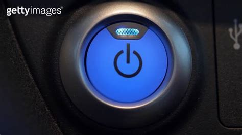 Pressing Stand By Power Button To Turn On And Off The Electric Car