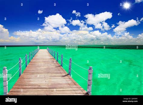 Wooden Pier Extending Into The Sea Stock Photo Alamy