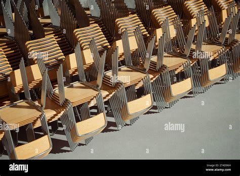 A Classroom Filled With Chairs And Tables Perfect For Educational