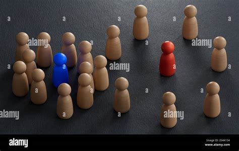 Introvert And Extrovert Concept Wooden Figurines On A Desk Economic