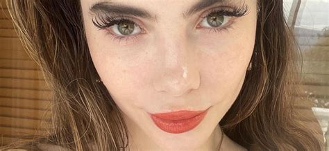 Gymnast Mckayla Maroney Opens Her Shirt On Rooftop Bar