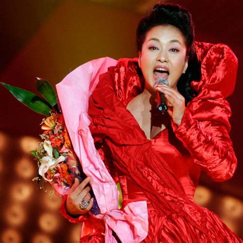 Chinas New Leader Xi Jinping And His Wife Singer Peng Liyuan