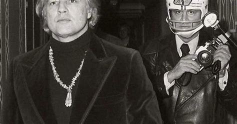 Paparazzi Photographer Ron Galella Would Wear A Football Helmet Around