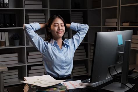 Premium Photo | Young beautiful Asian business woman relaxing after ...