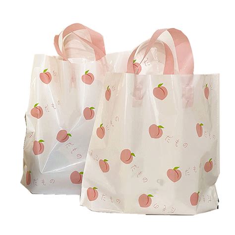 Ins网红夏日水蜜桃图案塑料手拎袋韩版服装店童装手提礼品包装袋虎窝淘