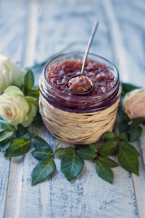 Roses Jam Food Background With A Glass Jars Full Of Tea Rose Jam Stock