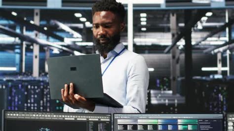 Happy Data Center Admin Using Node Tree Tool Doing High Five With