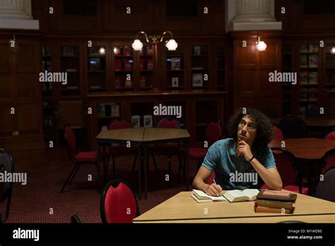 Man Studying In Library Stock Photo Alamy