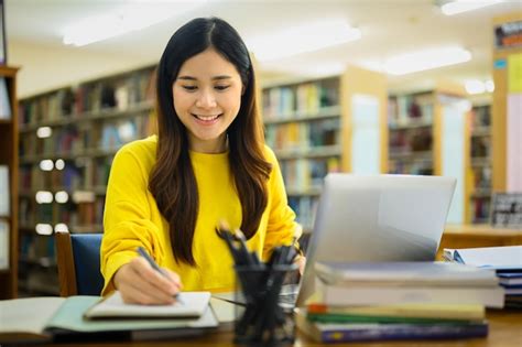 Premium Photo Beautiful Asian College Woman Preparing Report Doing