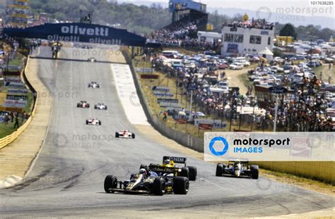 Elio De Angelis Lotus 97T Renault Leads Nigel Mansell Williams FW10
