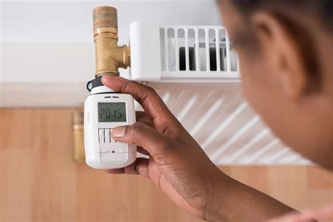 Adjusting Thermostat Stock Photos Royalty Free Adjusting Thermostat Images Depositphotos