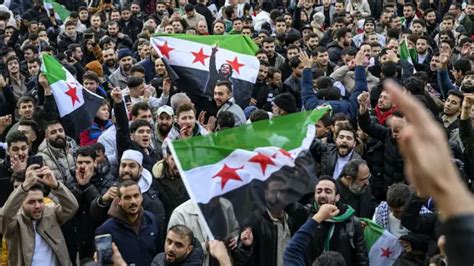 Syrian Rebels Raise New Flag Symbolising Freedom After Assads Rule