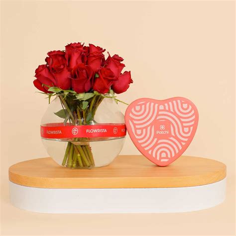 Patchi Tin Box Of 22 Pieces A Vase Of 20 Red Roses Alexandria Flowrista