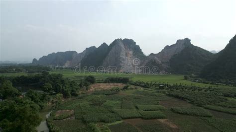 Small Plain With Crop Fields Near The Village And Wetlands Among The