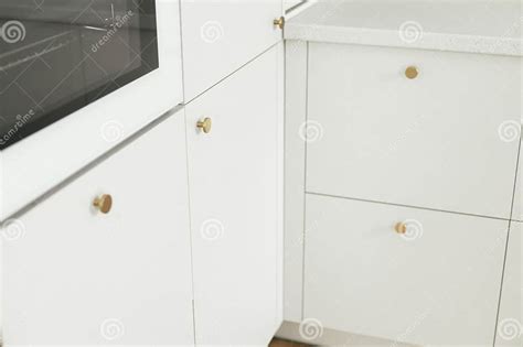 Modern Kitchen Interior Stylish White Kitchen Cabinets With Brass Knobs And Electric Oven Close
