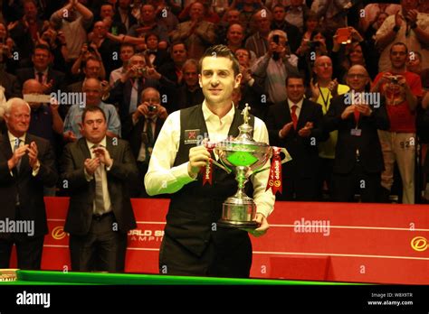 Mark Selby Of England Poses With His Champion Trophy After Defeating