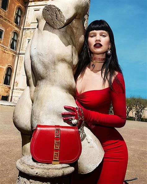 Lily James Dazzles In Crystal Plunge Dress For New Versace Campaign