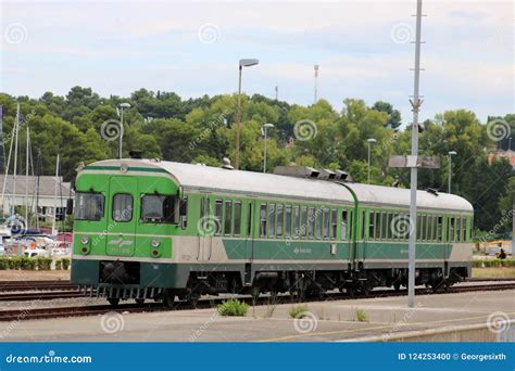 Diesel Multiple Unit Train Arriving At Station Editorial Photo