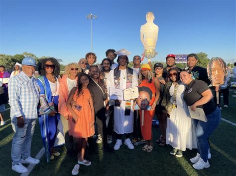 Quarterback Walks Stage And Throws Touchdown At Graduation Ceremony