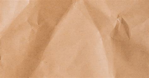 갈색 종이 봉지의 클로즈업 사진 Unsplash의 종이 질감 이미지