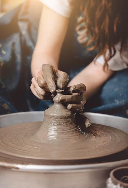 Premium Photo Artisan Pottery Woman Making A Small Pot