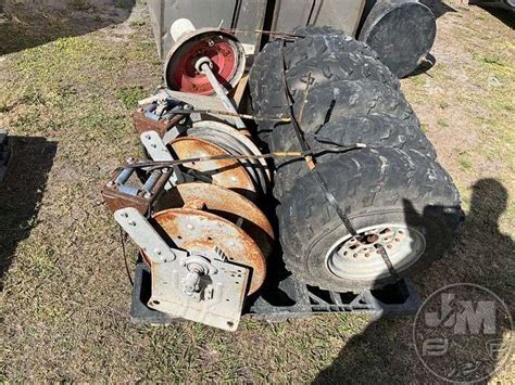 Pallet Of Hose Reels And Misc Tires Jeff Martin Auctioneers Inc