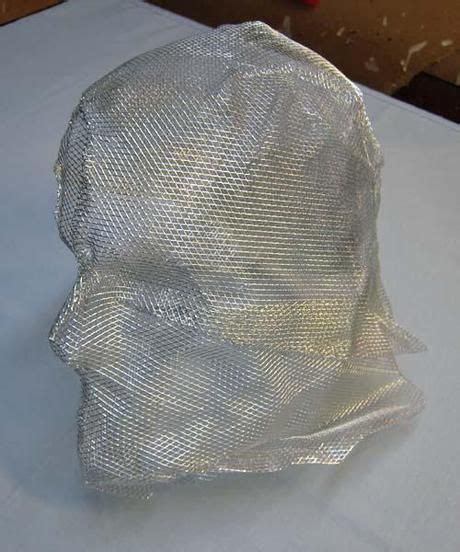 A White Hat Sitting On Top Of A Table