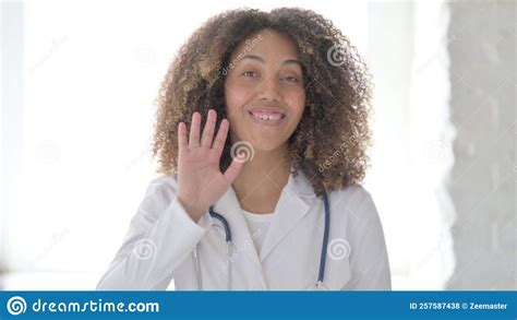 Afrcian Doctor Saying Hello By Waving Hand Stock Photo Image Of