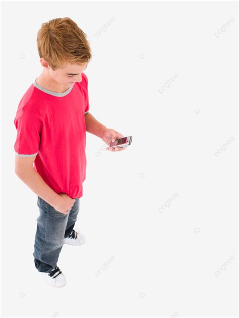 Young Boy Using Cellular Phone Cell Looking At Camera Text Messaging