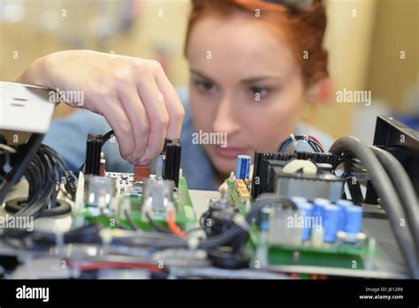 Woman Working On Electrical System Stock Photo Alamy
