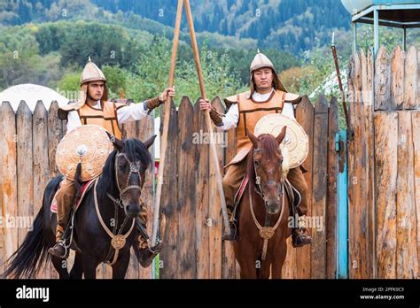 Two Horsemen In Front Of The Entrance To The Kazakh Ethnographic