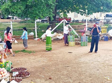 မင်းလှမြို့ ယာယီဈေးတွင် ကျန်းမာရေးနှင့်အားကစားဝန်ကြီးဌာနမှ ထုတ်ပြန်ထားသော စည်းကမ်းချက်များနှင့