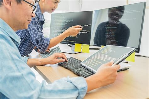 Premium Photo Programmer Working In A Software Development And Coding Technologies Website