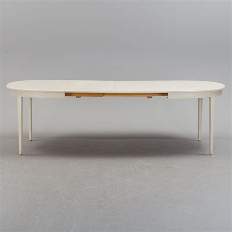 Carl Malmsten Sex Stolar Samt Två Karmstolar Och Matbord Med Två Iläggsskivor Herrgården