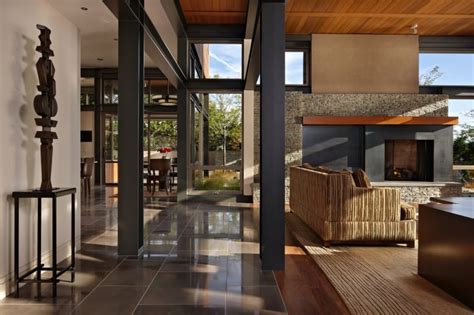 Grand Glass Lake House With Bold Steel Frame