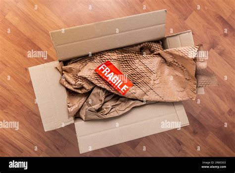 Delivery And Mail Service People And Shipment Concept Fragile Mark