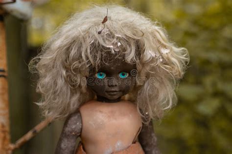 Creepy Doll At The Backyard Of The Kindergarten At The Abandoned