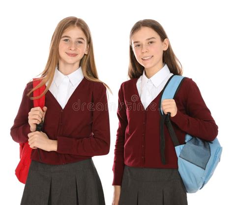 十几岁的女孩画象校服的有在白色的背包的 库存图片 图片 包括有 突出 逗人喜爱 子项 成套装备 147755895
