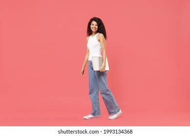 18 Full Body Side Profile View Woman Holding Closed Laptop Pc Computer Walking Royalty Free