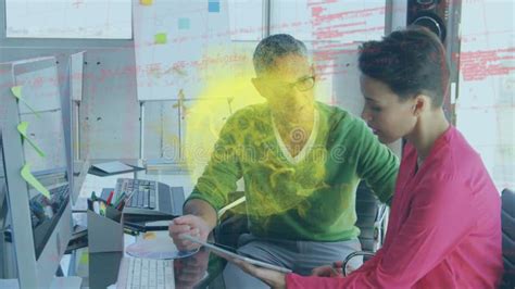 Animation Of Globe And Data Over Diverse Coworkers In Office Stock