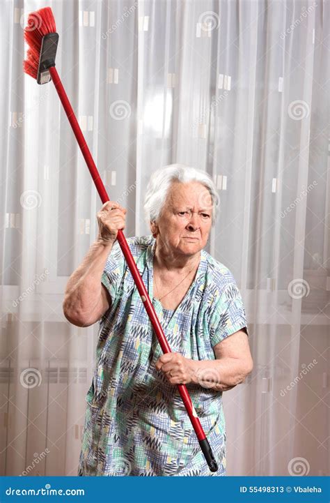 Old Angry Woman Threatening With A Broom Stock Image Image Of