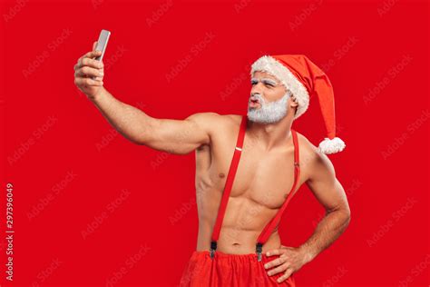 Christmas Freestyle Young Bearded Santa Claus Bare Muscular Upper Body
