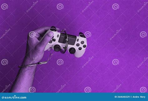 Video Game Joystick And Handcuffs Isolated Addiction To Games Concept