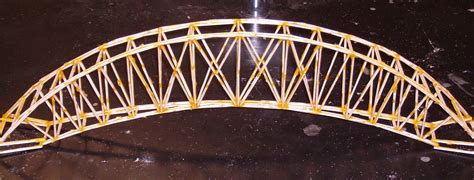 Double Curved Model Truss Using Small Sticks Of Wood Bridge Design
