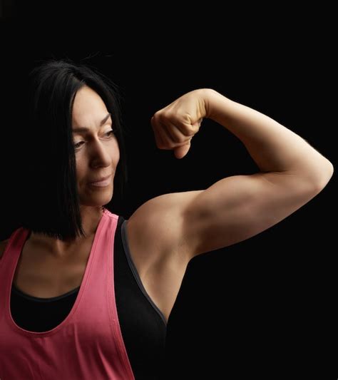 Premium Photo Beautiful Athletic Girl Raised And Bent Her Arm