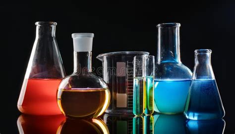 Laboratory Analysis Different Glassware With Colorful Liquids On Black